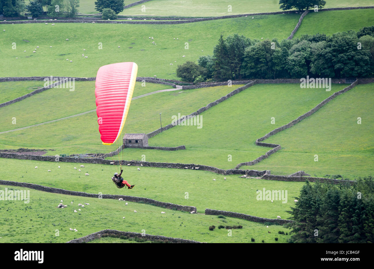 A member of the Dales Hang Gliding and Paragliding Club flies a ...