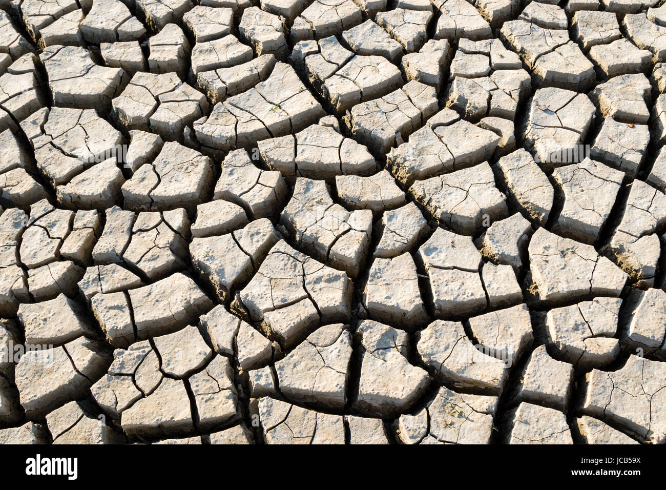 drought barren, cracked, dry, crusty patch of land Stock Photo - Alamy