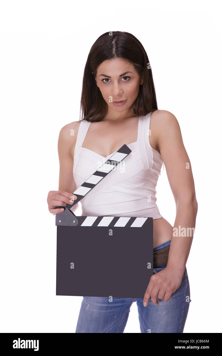 Beautiful smiling woman holding a movie clapper. Girl helps in shooting ...