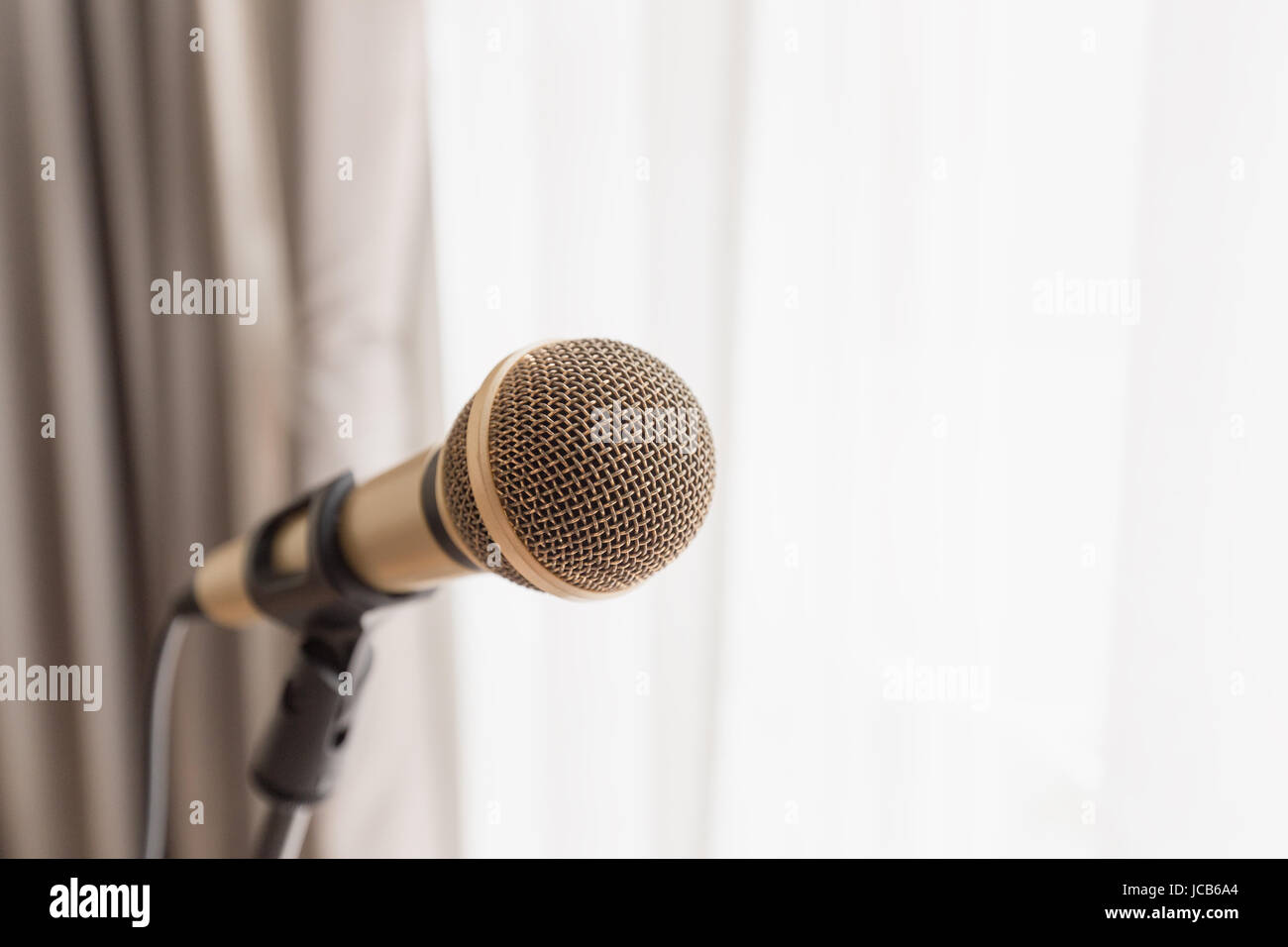 Gold microphone stand hi-res stock photography and images - Alamy
