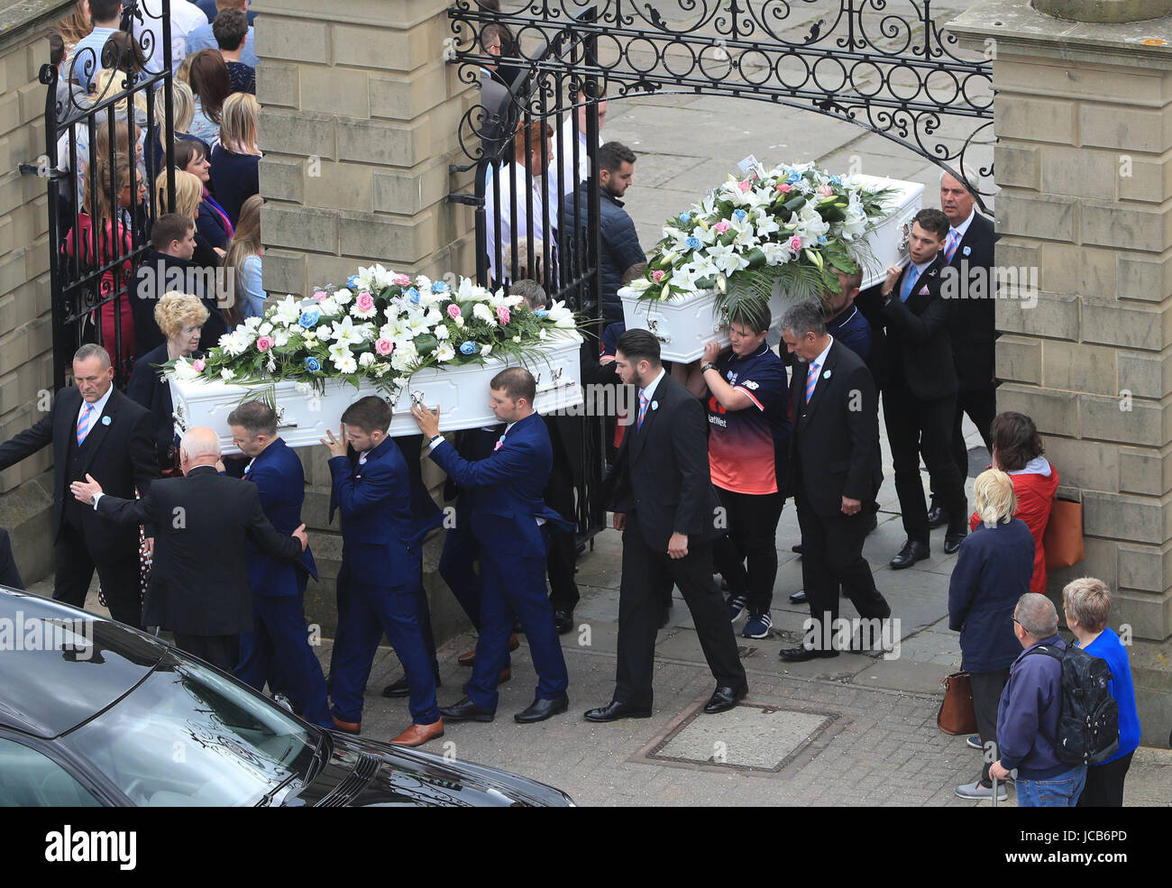 The coffins of Chloe Rutherford (front) and Liam Curry, who were killed ...
