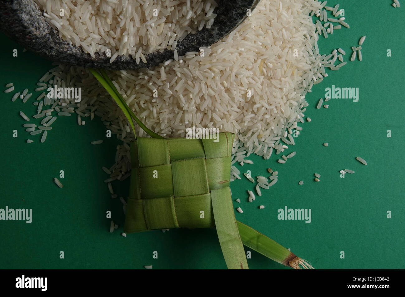 Rice dumpling on green background Stock Photo - Alamy