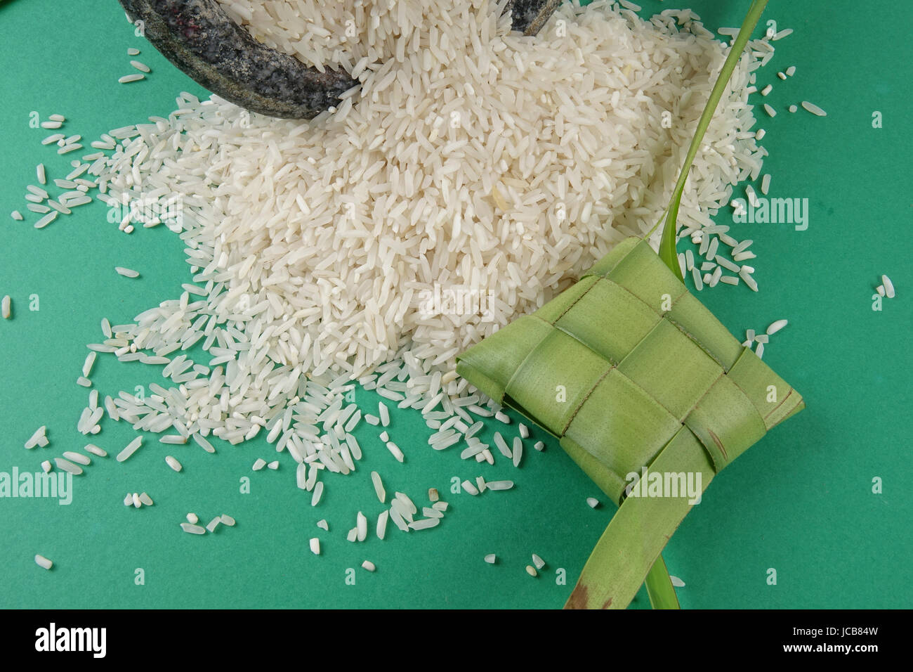 Rice dumpling on green background Stock Photo - Alamy