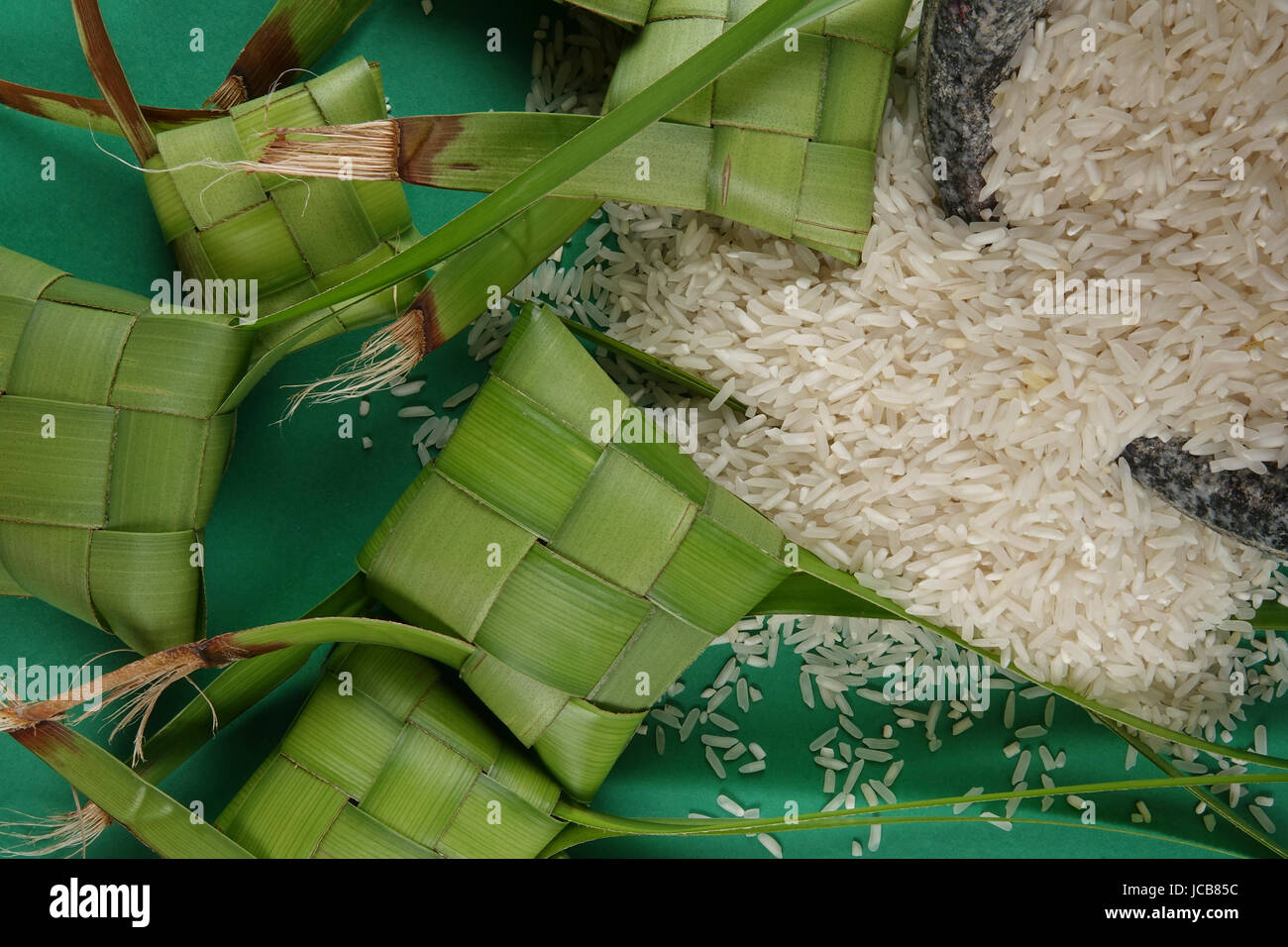 Rice dumpling on green background Stock Photo - Alamy