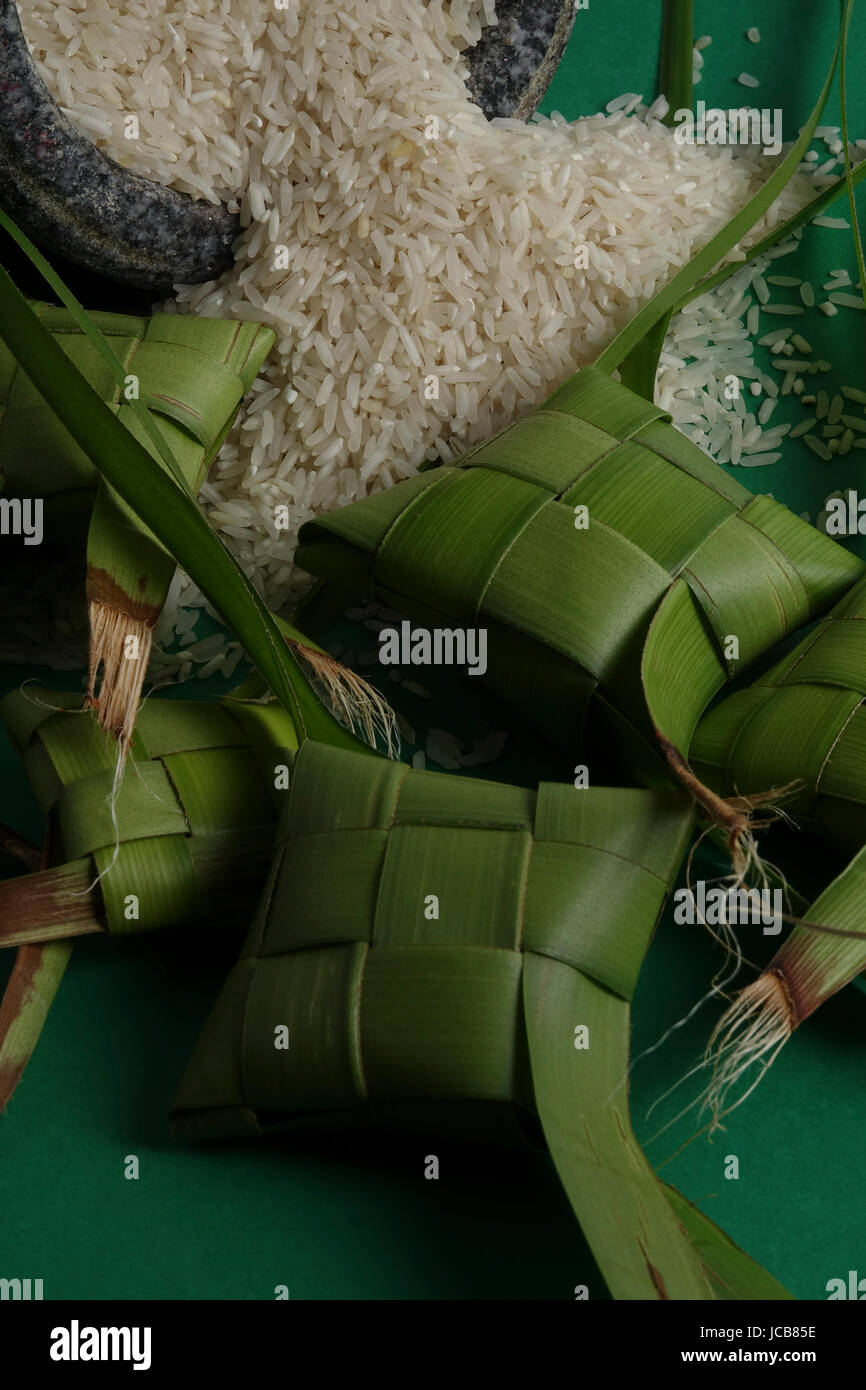 Rice dumpling on green background Stock Photo - Alamy