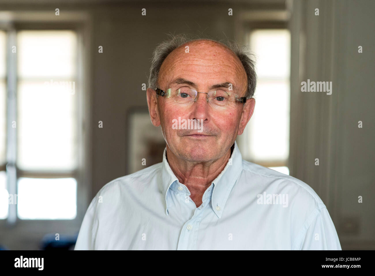 Portrait of Dominique Wolton at his place 14/09/2016 Â©Hannah ASSOULINE ...