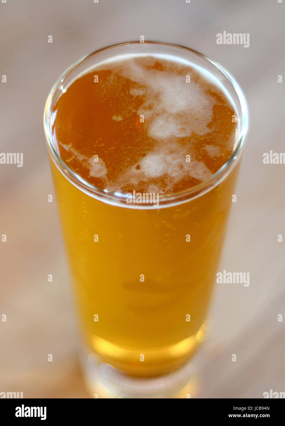 Beer in a pint glass Stock Photo - Alamy