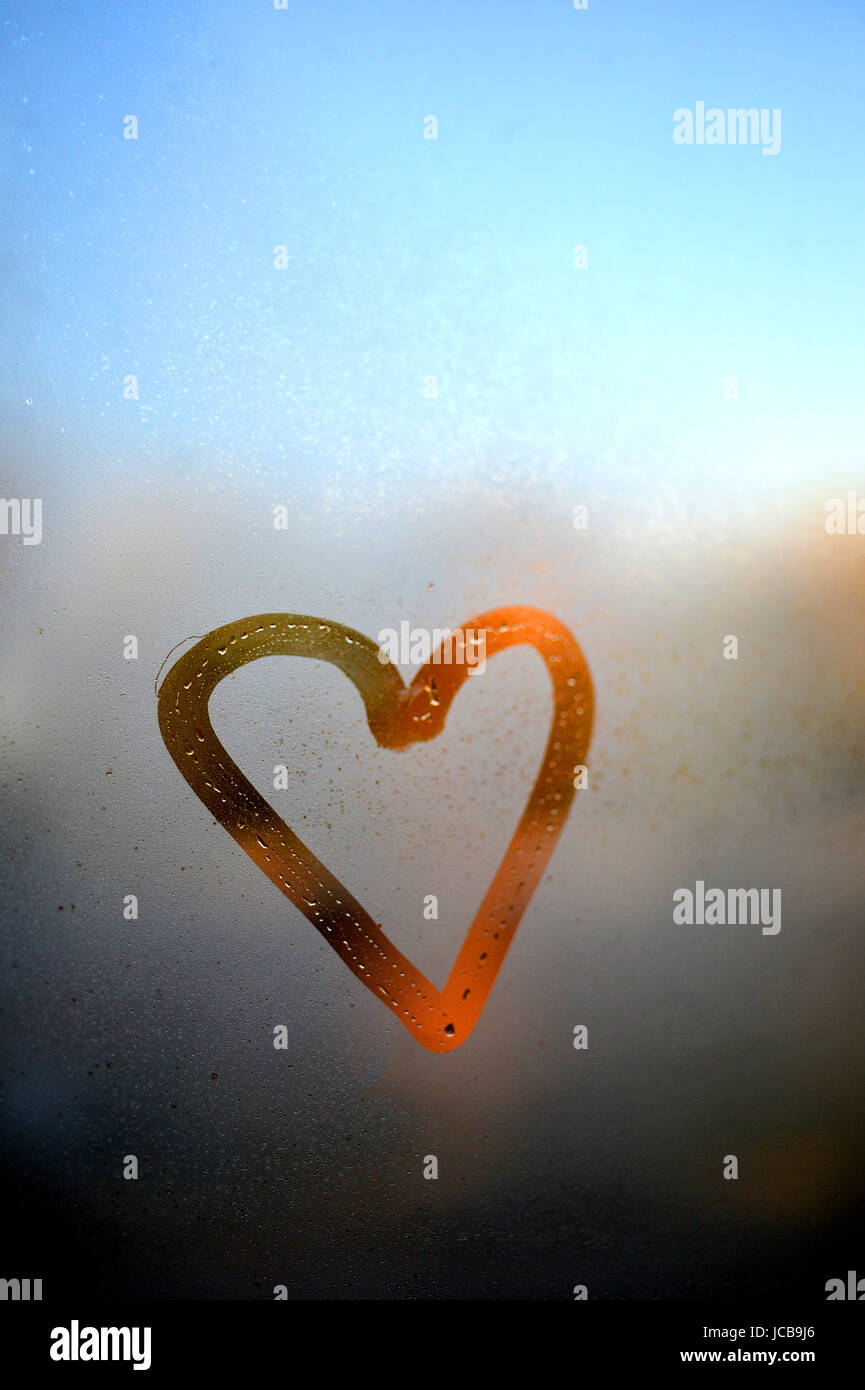 Heart drawn on a foggy window Stock Photo - Alamy