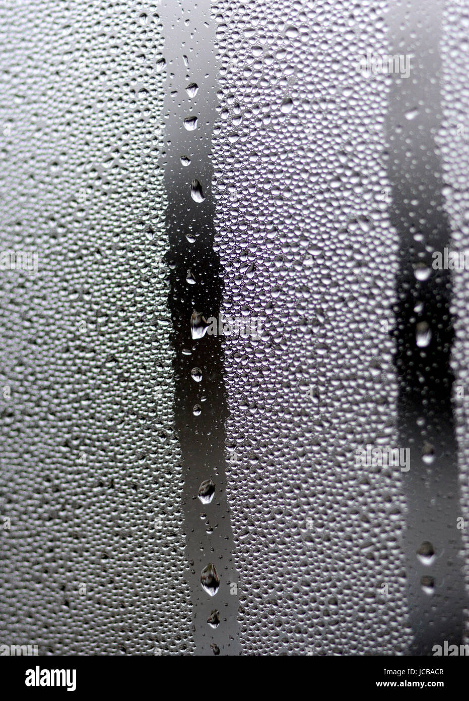 Rain on a window Stock Photo - Alamy