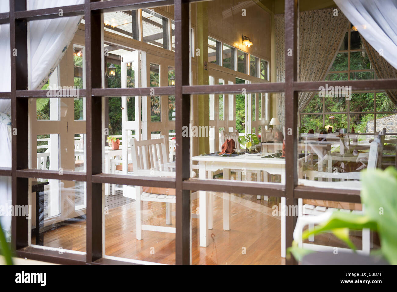 Looking at the restaurant interior scene through the window Stock Photo ...
