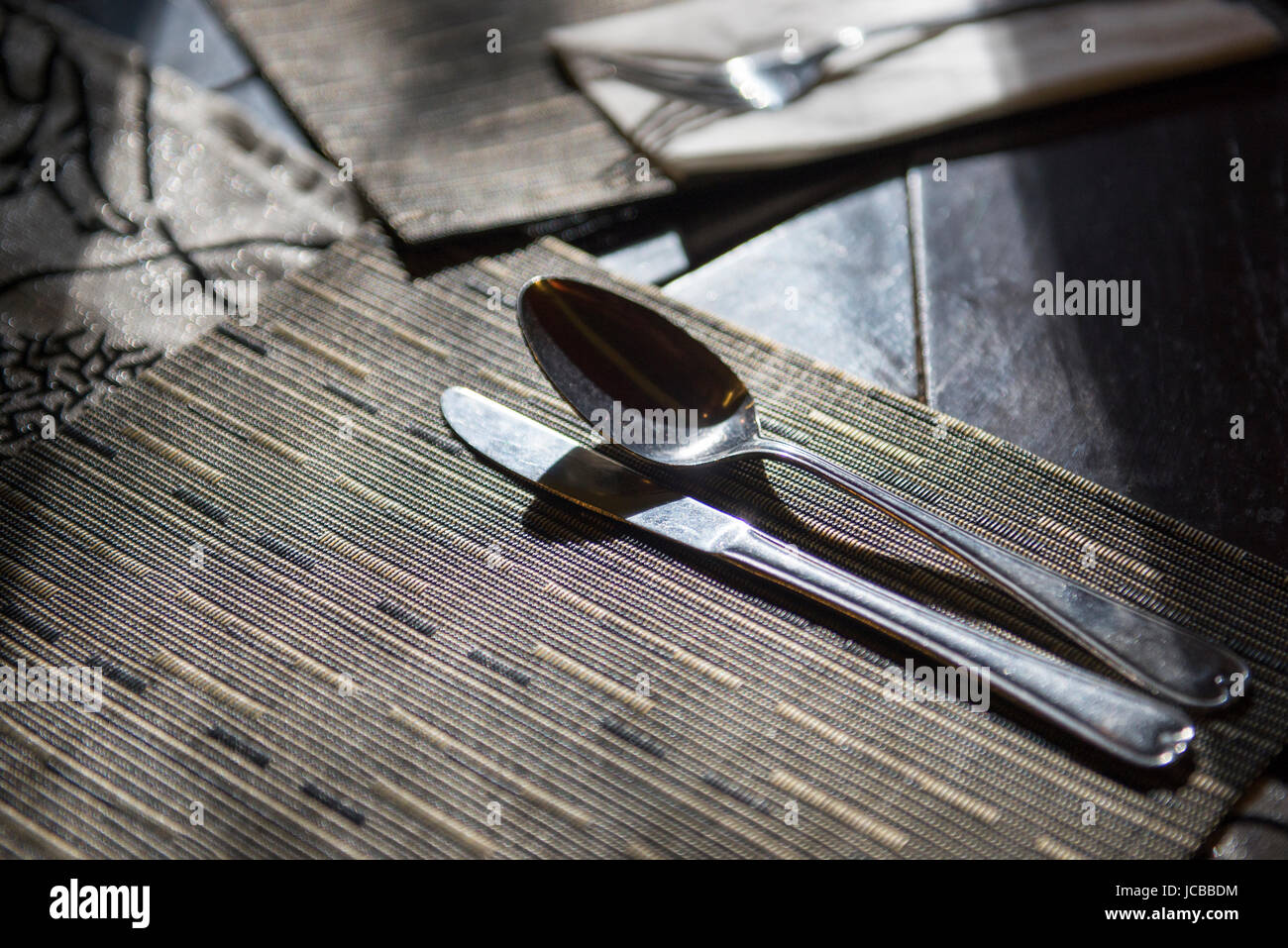A spoon and a knife close-up Stock Photo - Alamy