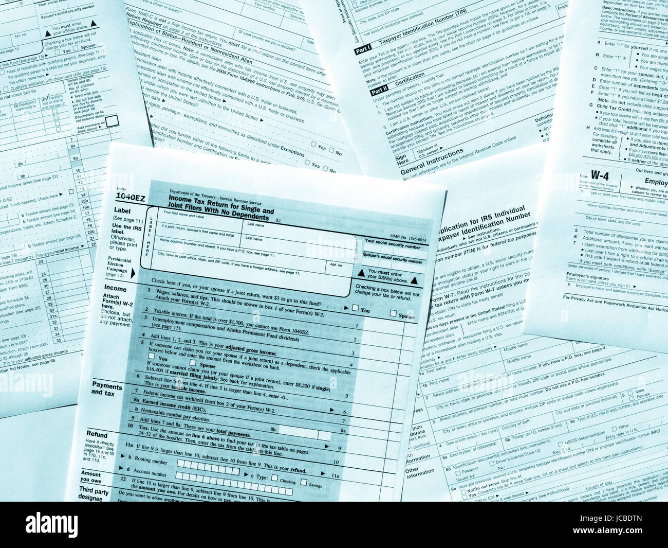 Range of various blank USA tax forms - cool cyanotype Stock Photo - Alamy