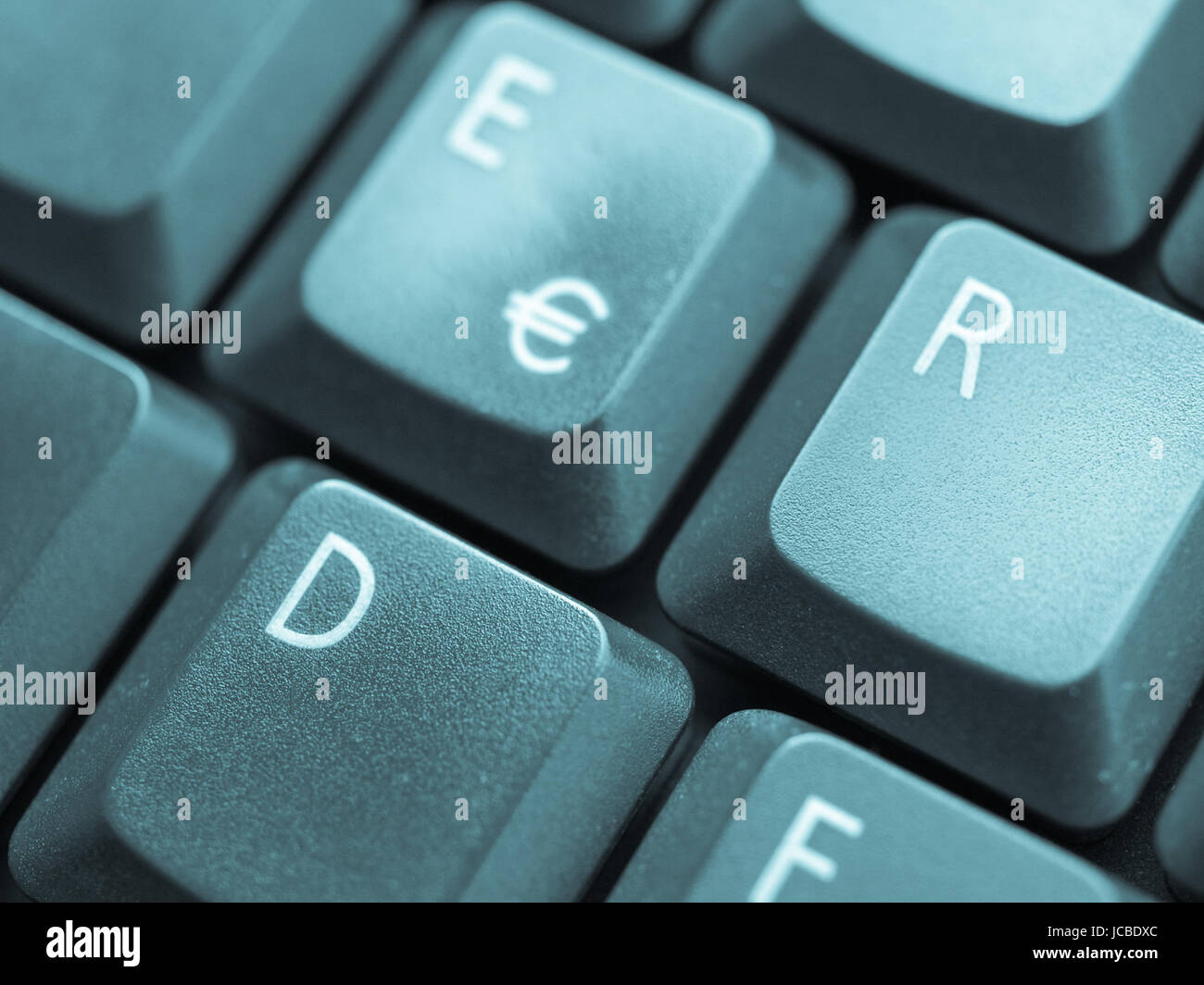 Detail of keys on a computer keyboard - cool cyanotype Stock Photo - Alamy