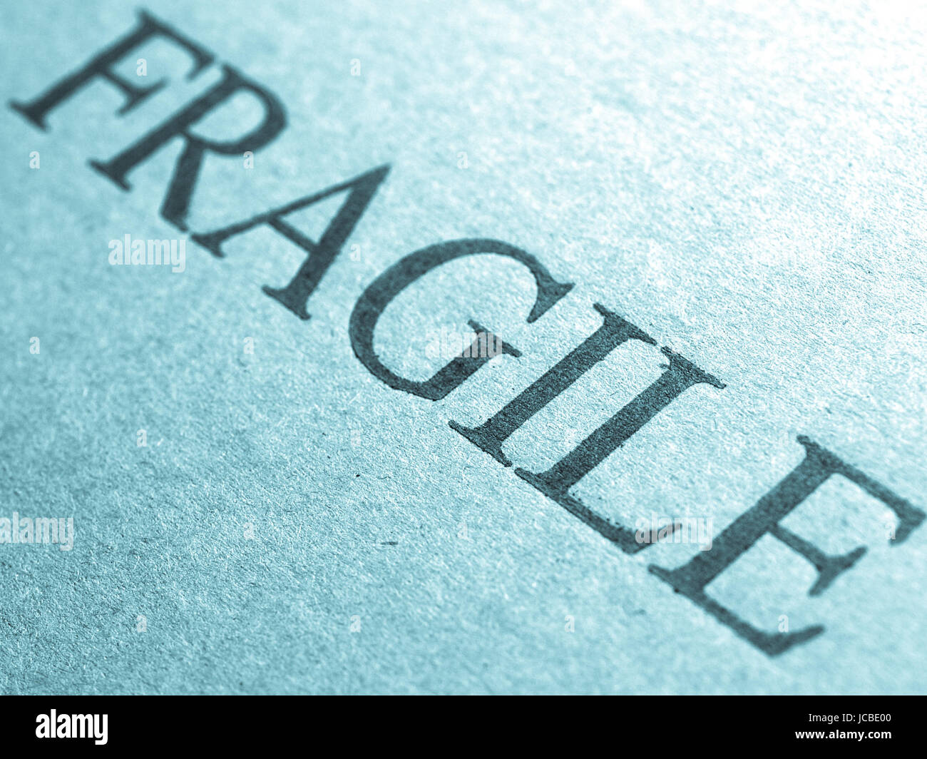 Detail of a fragile corrugated cardboard packet - cool cyanotype Stock Photo - Alamy