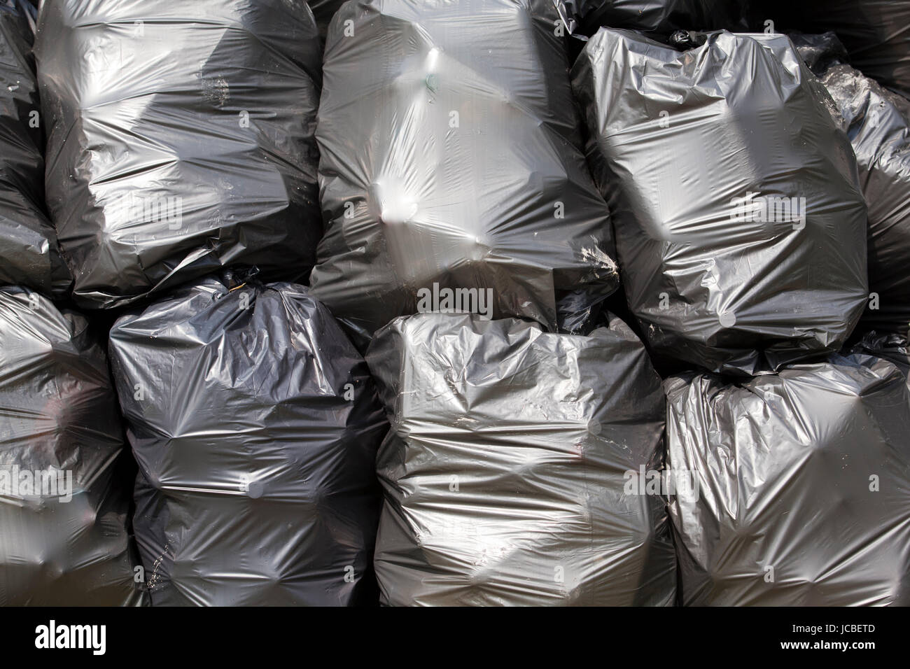 black garbage bags Stock Photo - Alamy