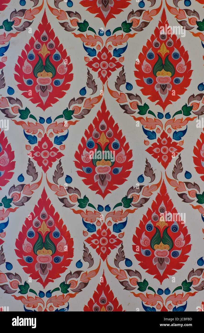 Traditional Thai flower art on temple door Stock Photo - Alamy