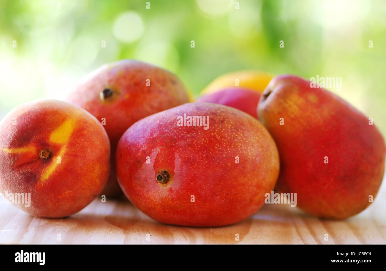 Peach, mango and pear fruits Stock Photo - Alamy