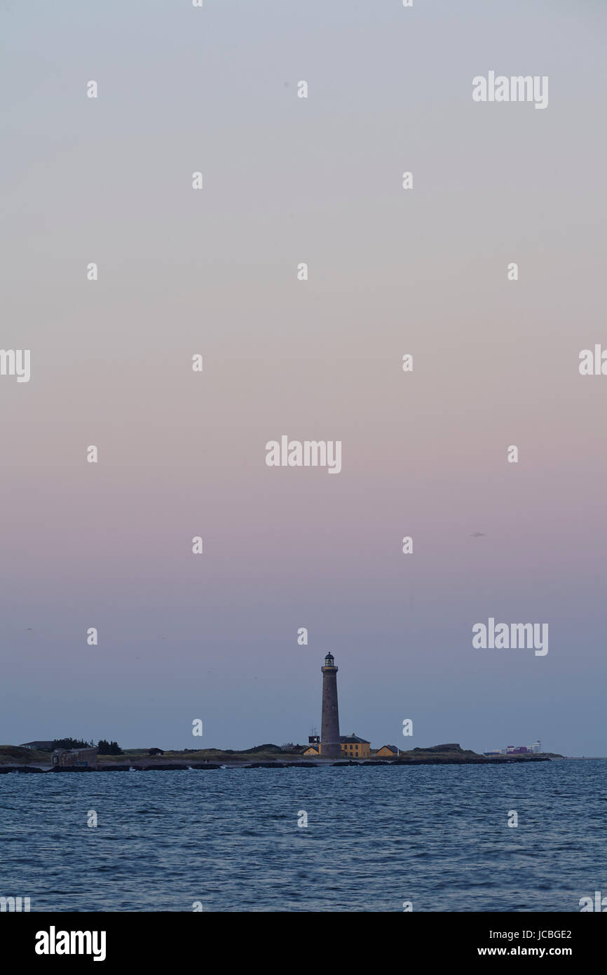 The lighthouse Grenen (called Grey Tower) near Skagen at the junction ...