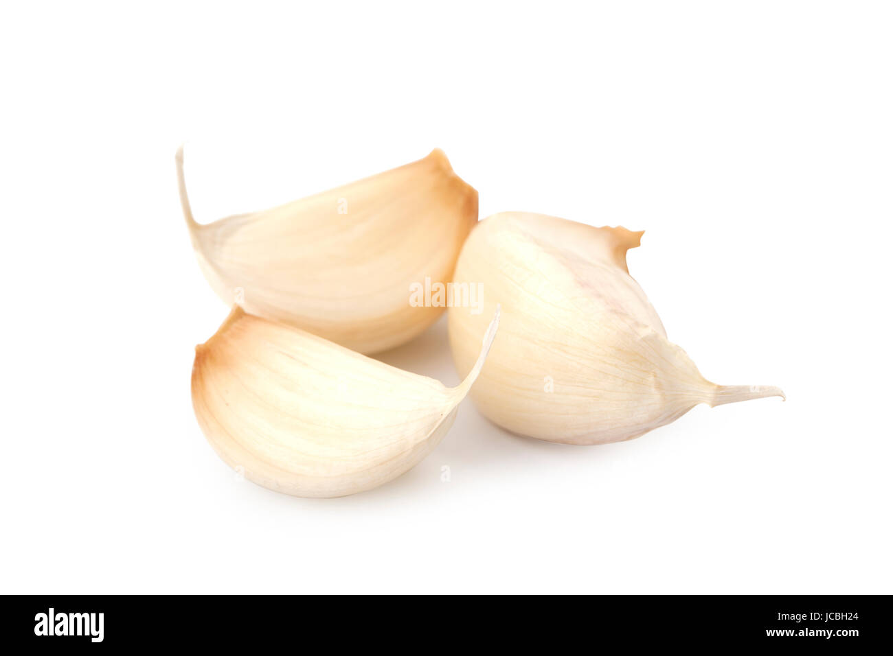 Garlic head and cloves on white background with path Stock Photo - Alamy