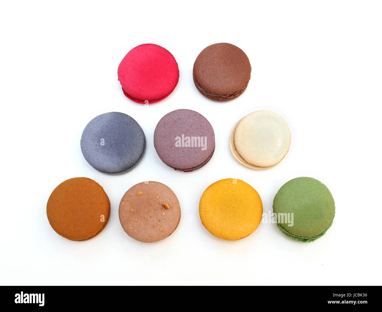 Colorful sweet macaroons biscuits on white background Stock Photo - Alamy
