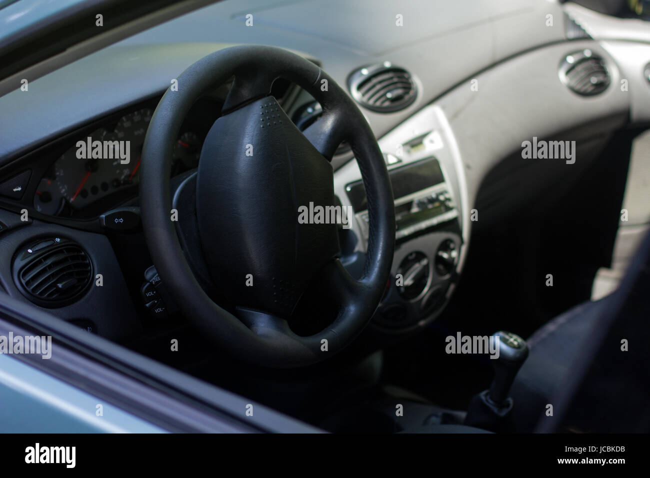 Interior of car focus on the steering wheel Stock Photo - Alamy