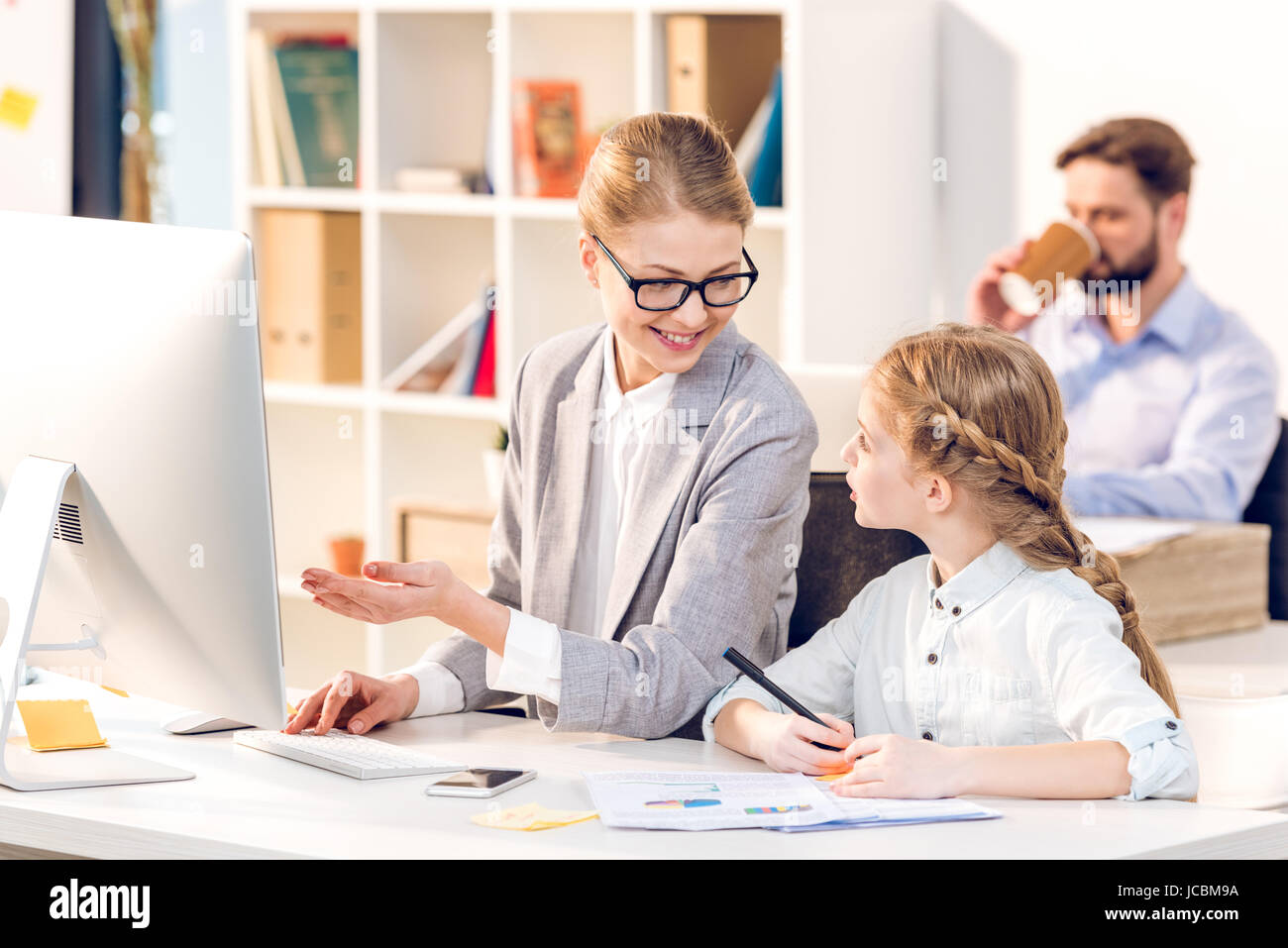 Business and family hi-res stock photography and images - Alamy