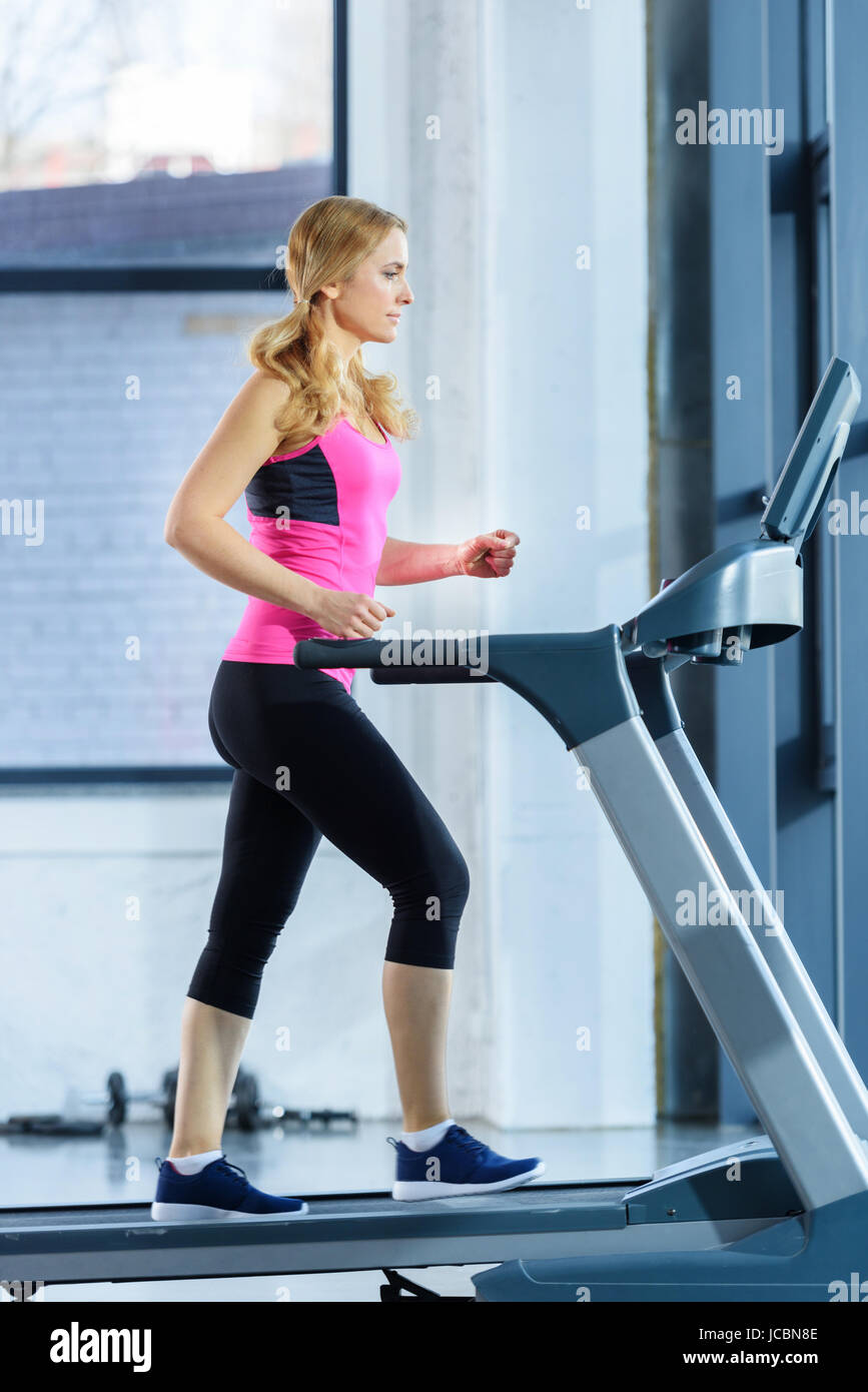 Person on treadmill profile view hi-res stock photography and images ...