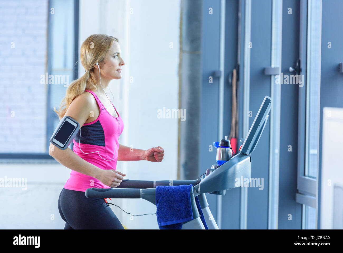 Person on treadmill side profile view hi-res stock photography and ...