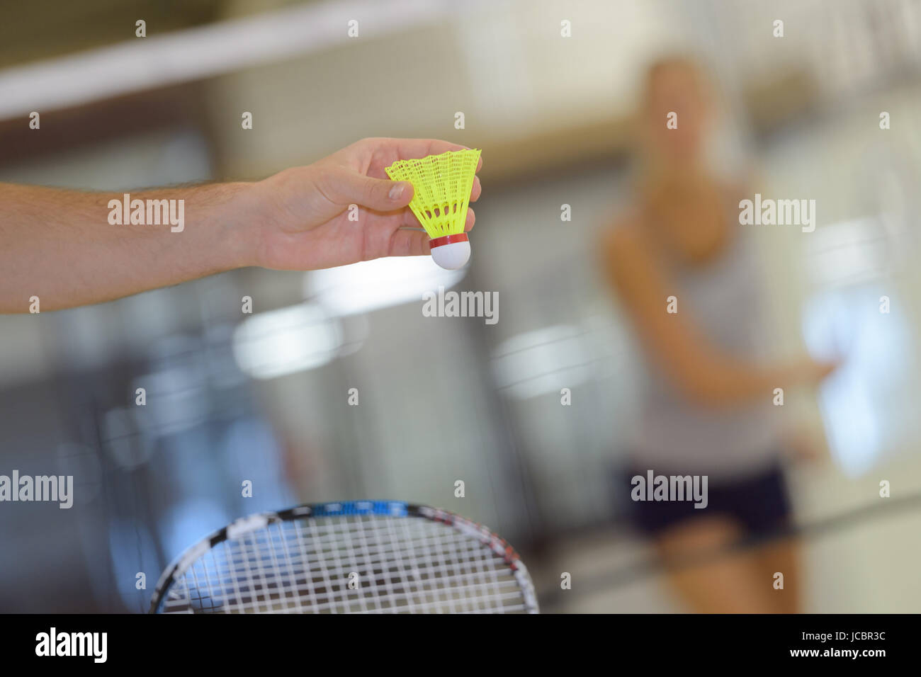 shuttlecock in hand Stock Photo - Alamy