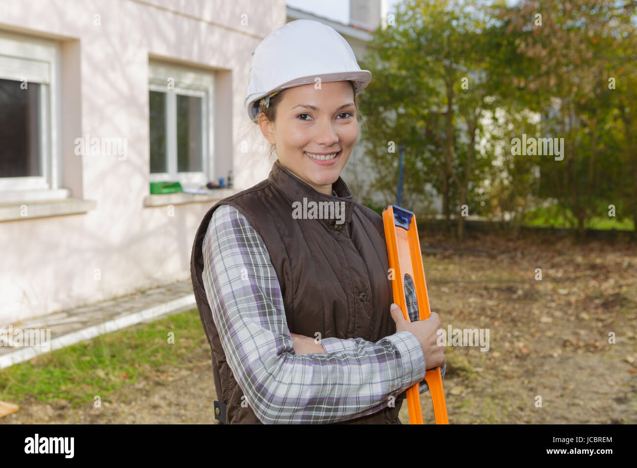 female surveyor at a construction site outdoors Stock Photo - Alamy