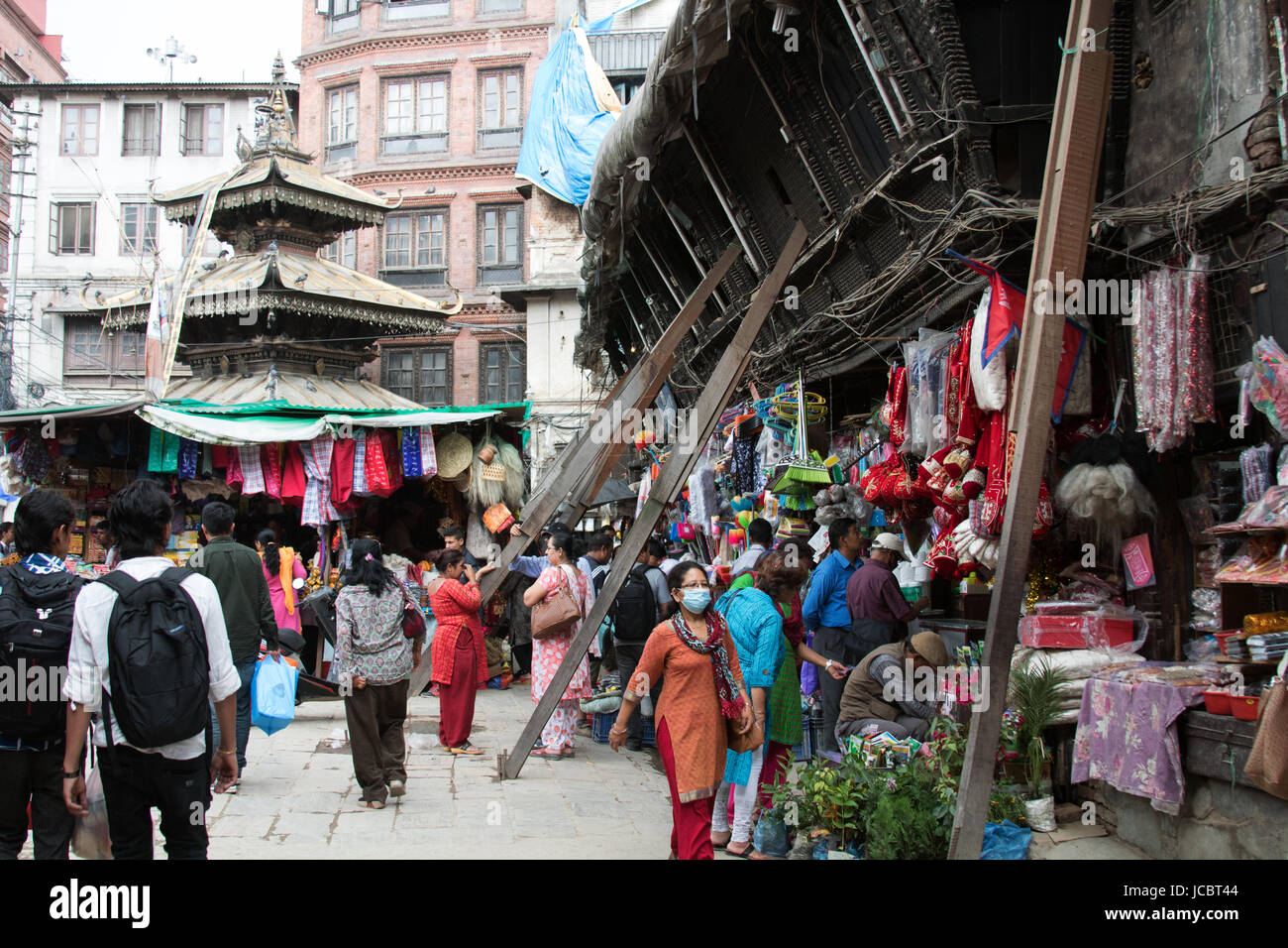 Shops and shoppers in the narrow streets around Durbar Square ...