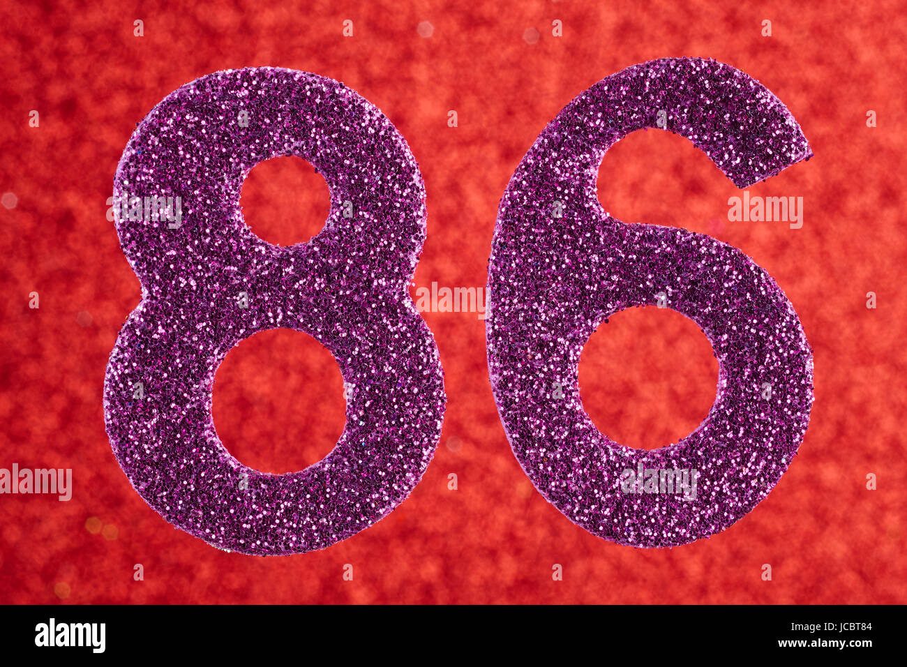 Number eighty-six purple color over a red background. Anniversary ...