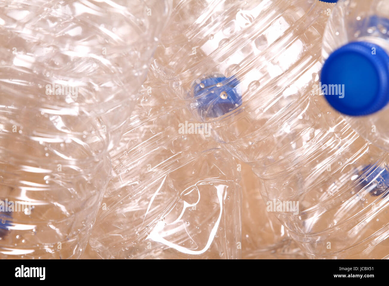 Bottles of water for recycling background Stock Photo - Alamy