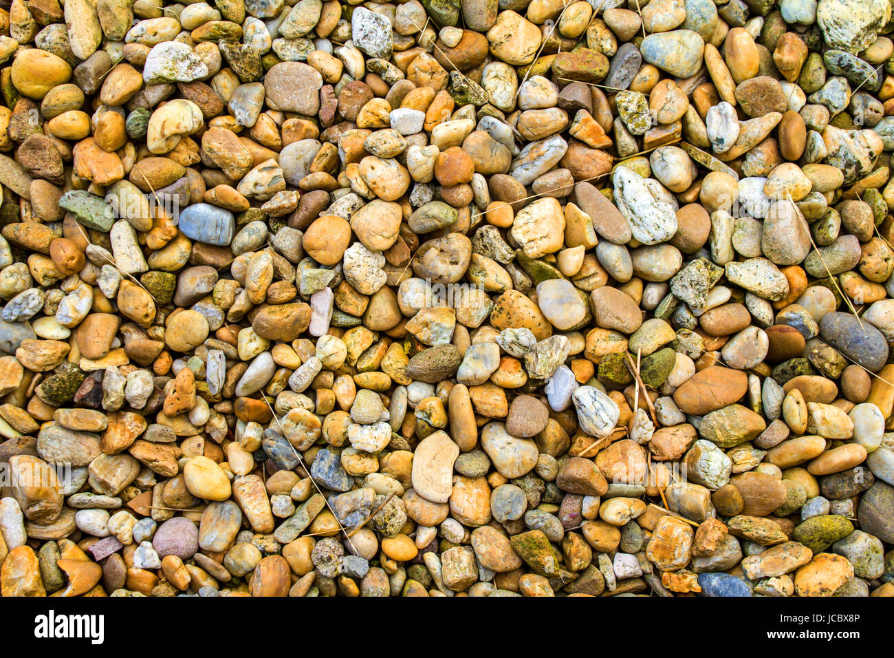 Rocks in different colors and shapes, background Stock Photo - Alamy