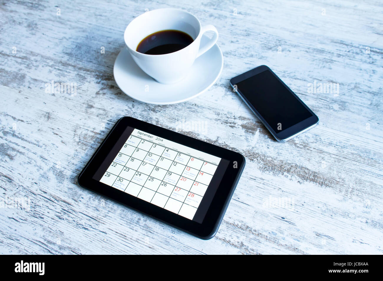 Checking monthly activities and appointments at the office in the ...