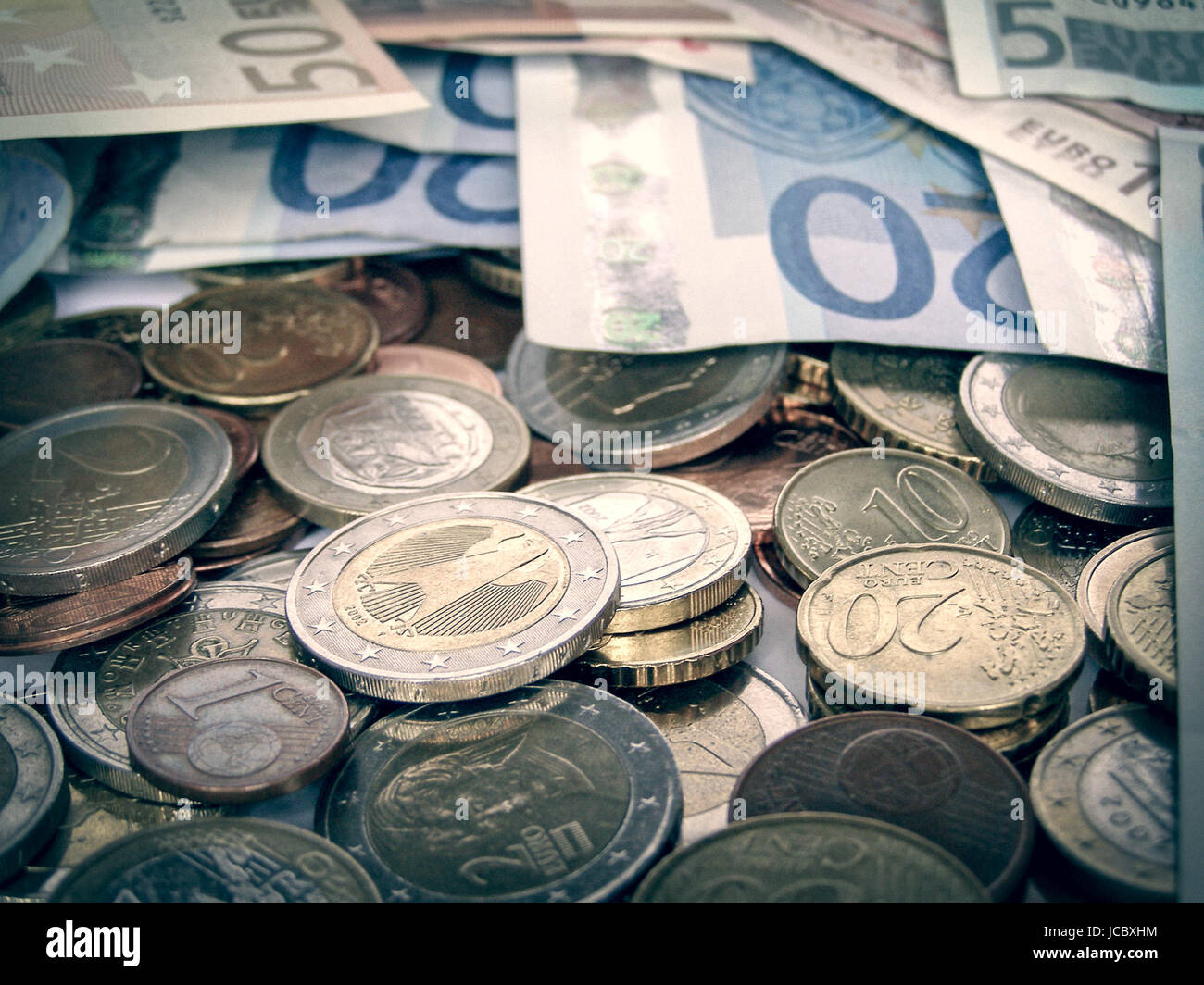 Vintage looking Euro banknotes and coins picture Stock Photo - Alamy