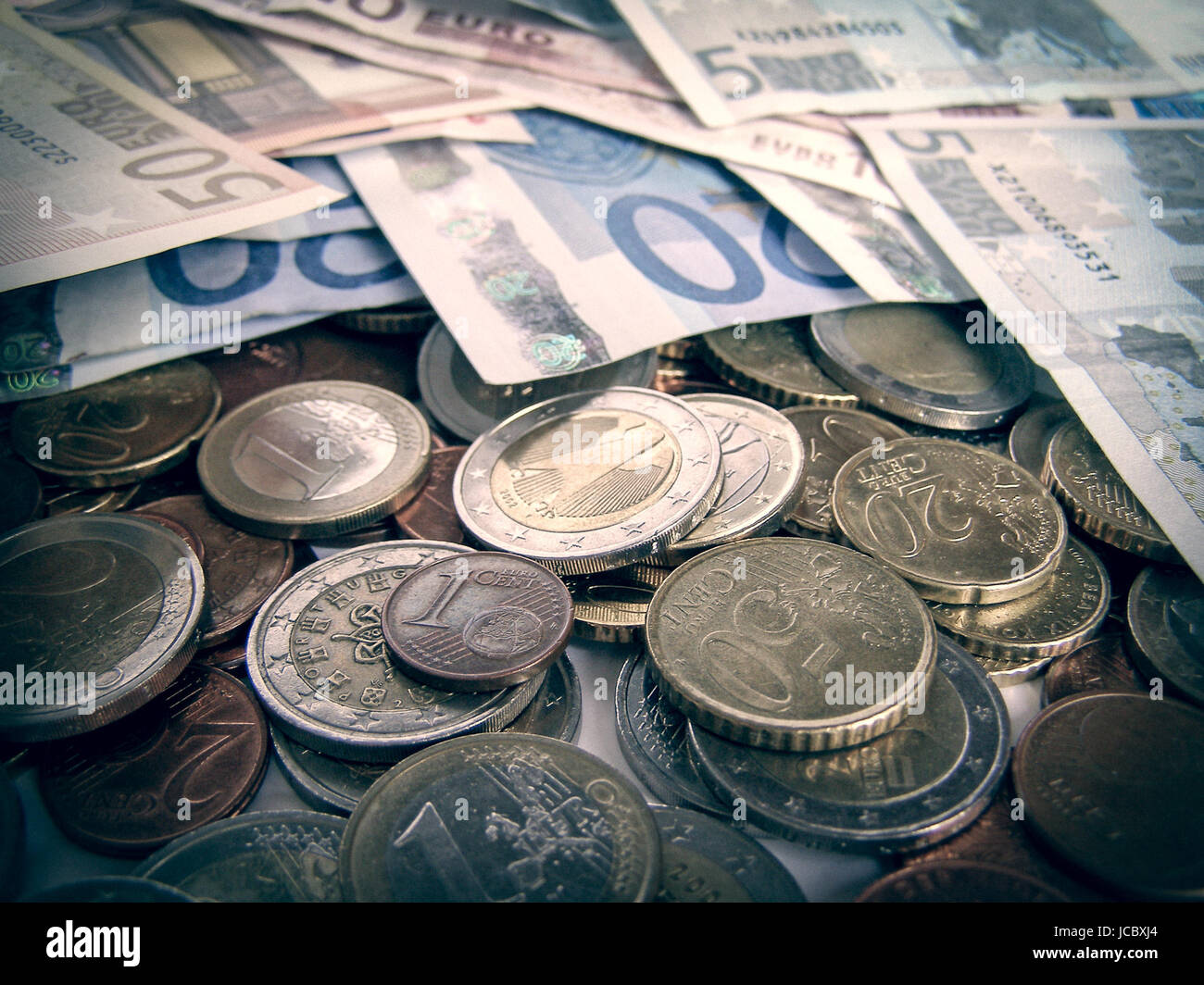 Vintage looking Euro banknotes and coins picture Stock Photo - Alamy