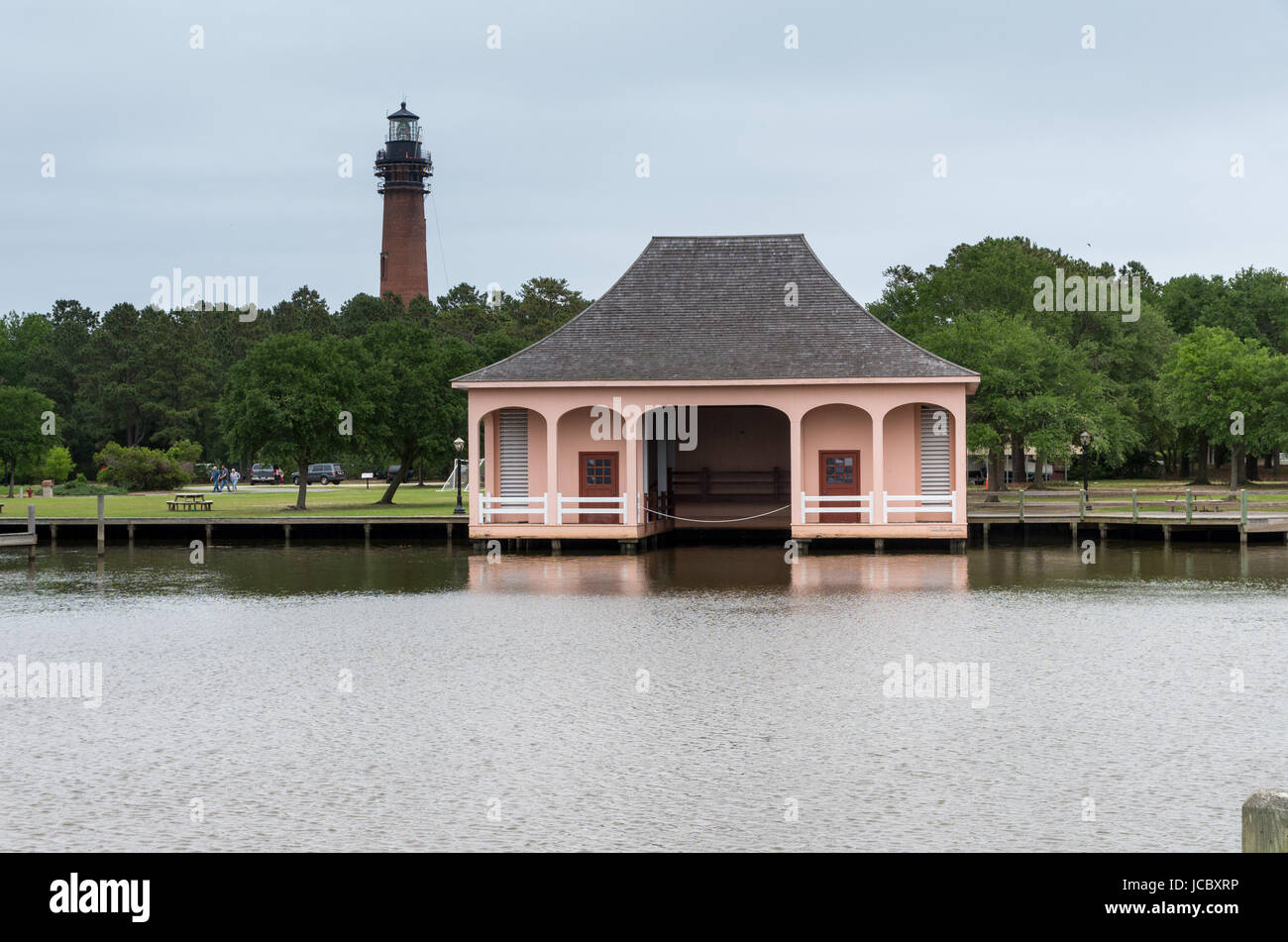 boat house at Whalehead club with Currituck lighthouse in the ...