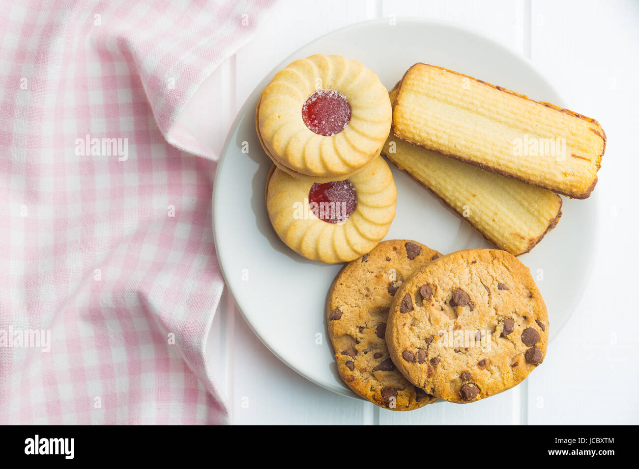 Various sweet biscuits on plate. Top view Stock Photo - Alamy