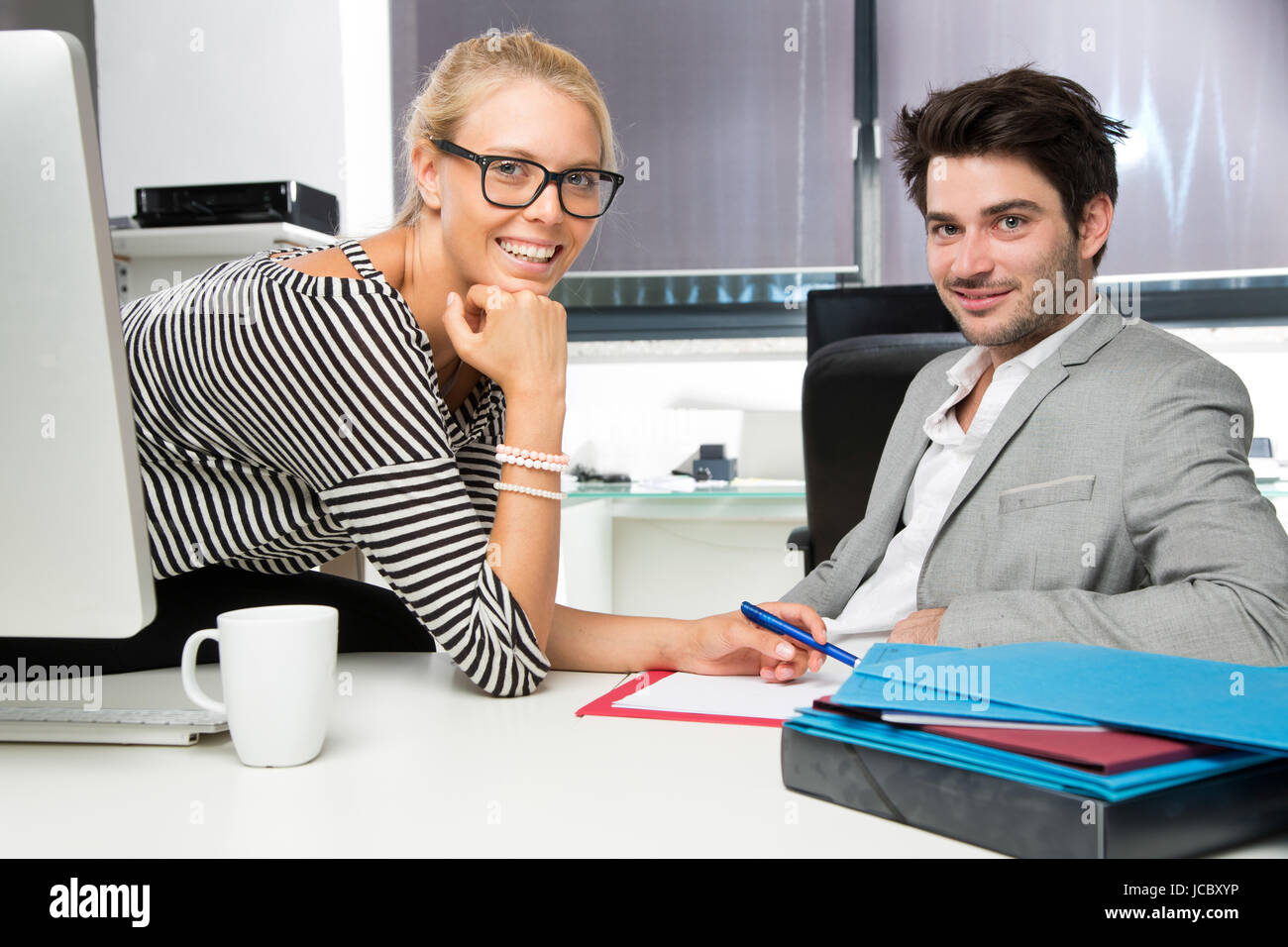 colleague in the office Stock Photo - Alamy