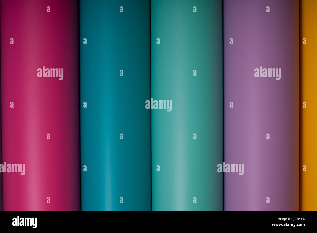 Colorful plastic film background in a row Stock Photo - Alamy
