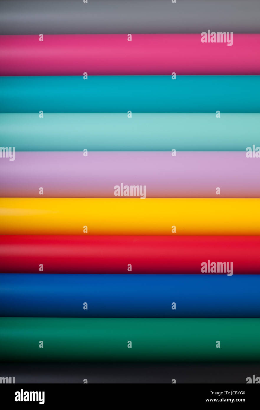 Colorful plastic film background in a row Stock Photo - Alamy
