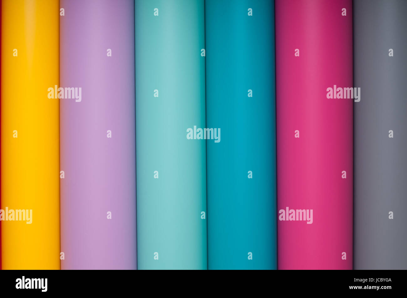 Colorful plastic film background in a row Stock Photo - Alamy