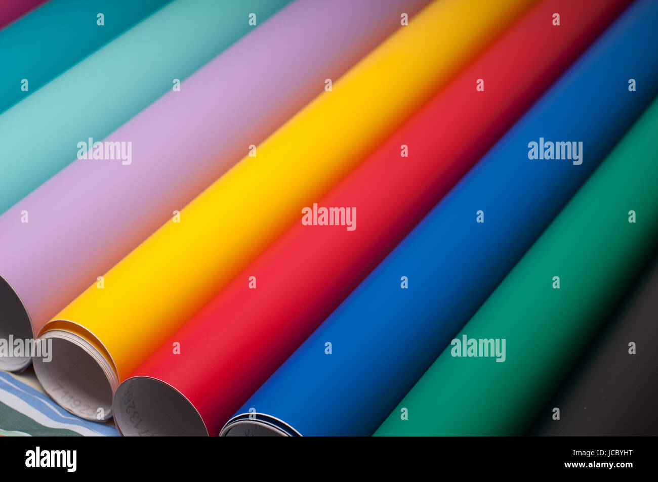 Colorful plastic film background in a row Stock Photo - Alamy