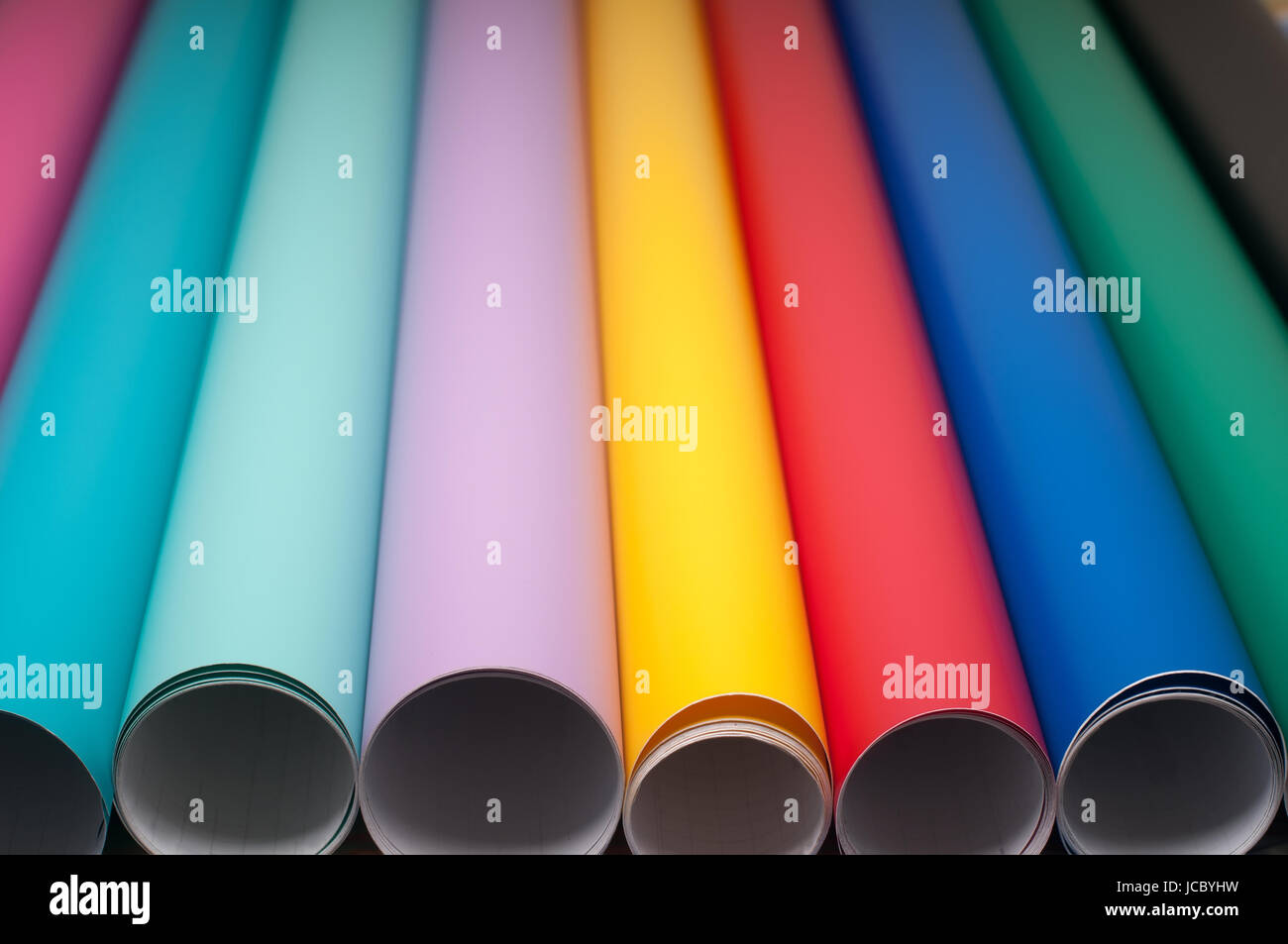 Colorful plastic film background in a row Stock Photo - Alamy
