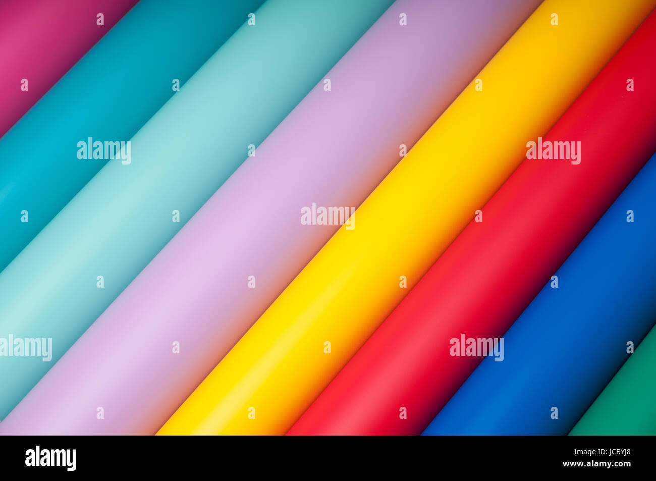 Colorful plastic film background in a row Stock Photo - Alamy