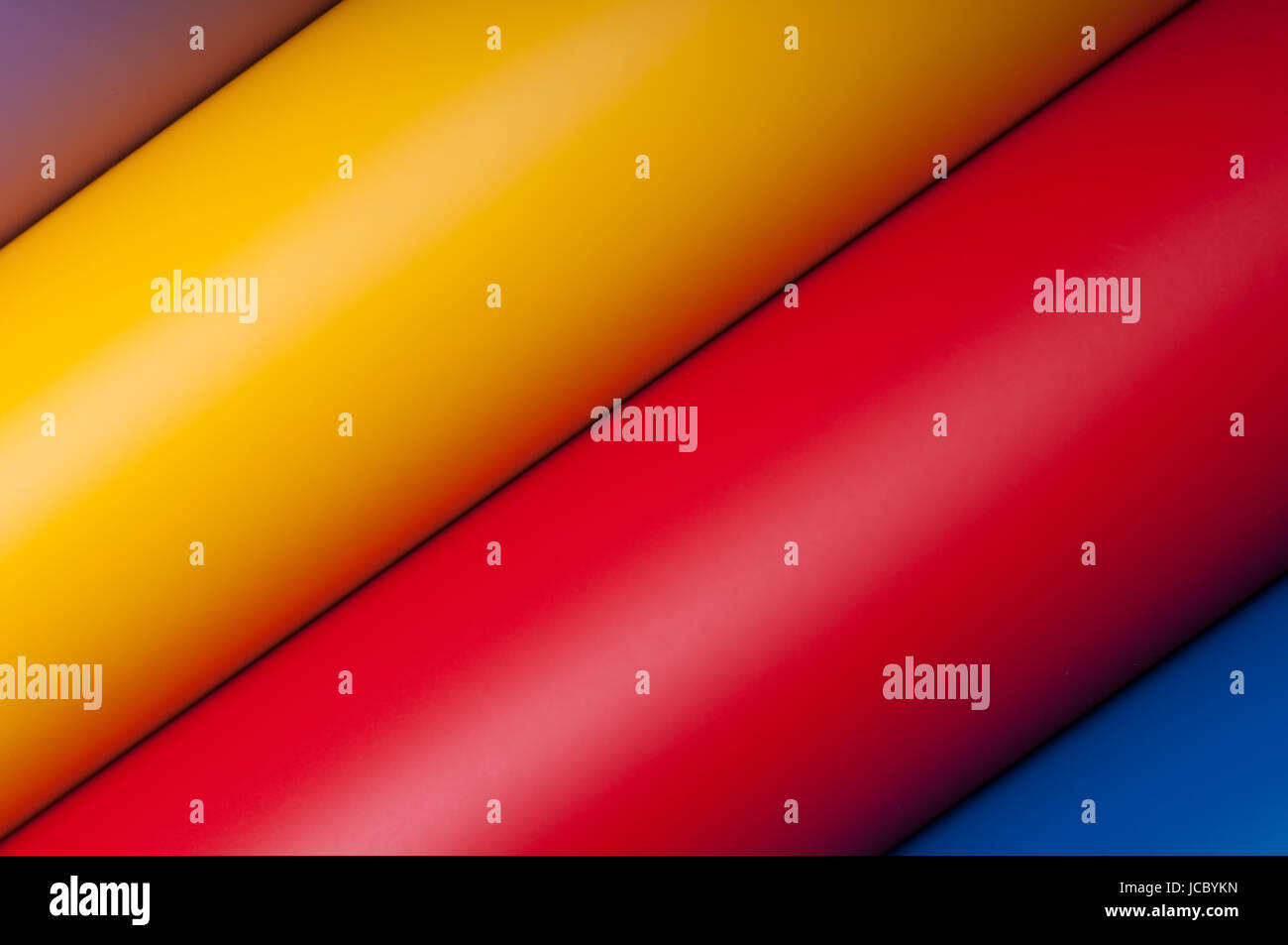 Colorful plastic film background in a row Stock Photo - Alamy