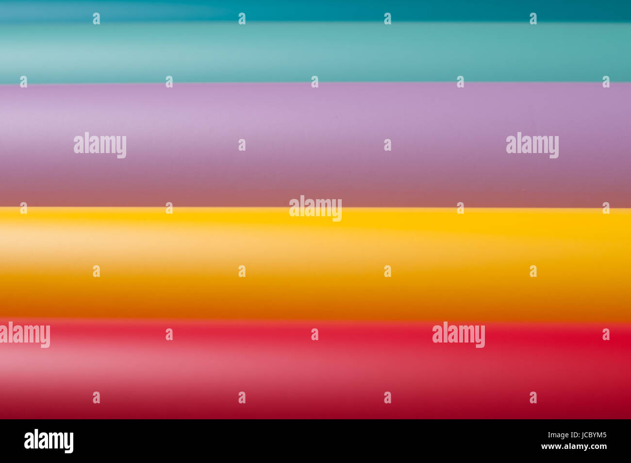 Colorful plastic film background in a row Stock Photo - Alamy