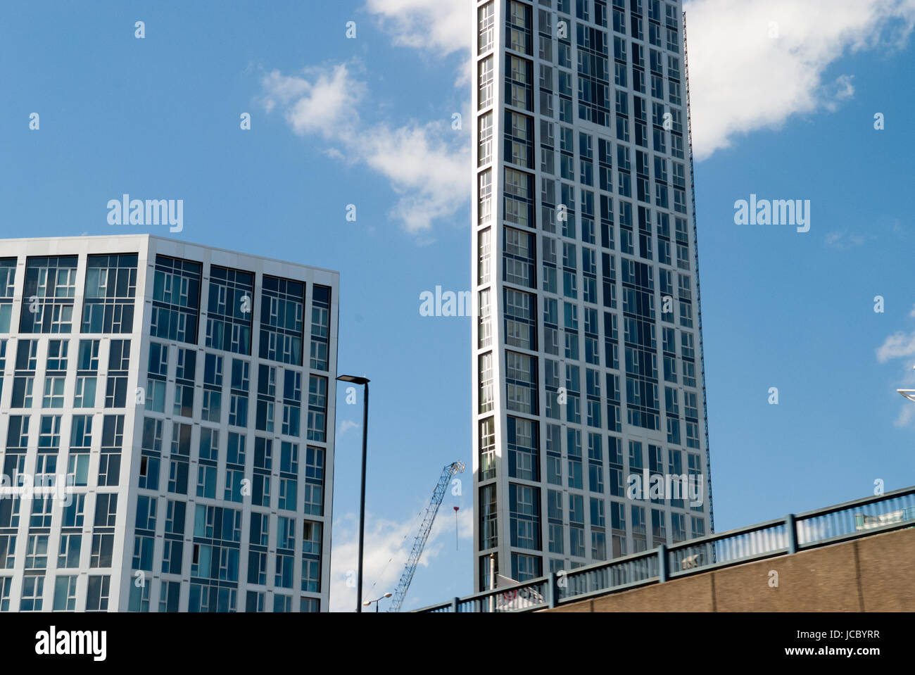 Tall office buildings with blue sky background Stock Photo - Alamy