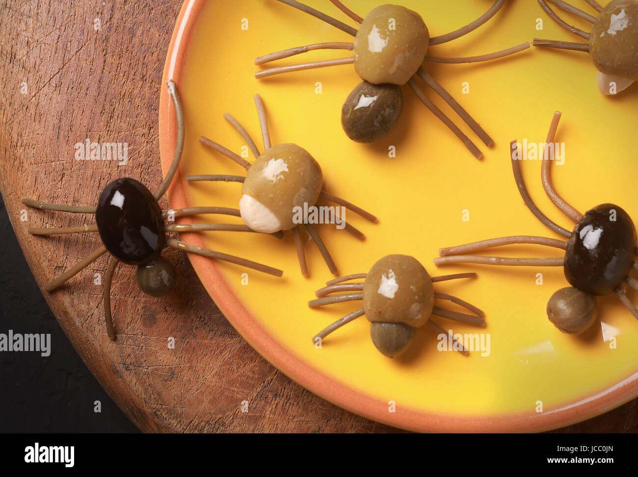 Cute spooky Halloween spider appetizers made from green, black and ...